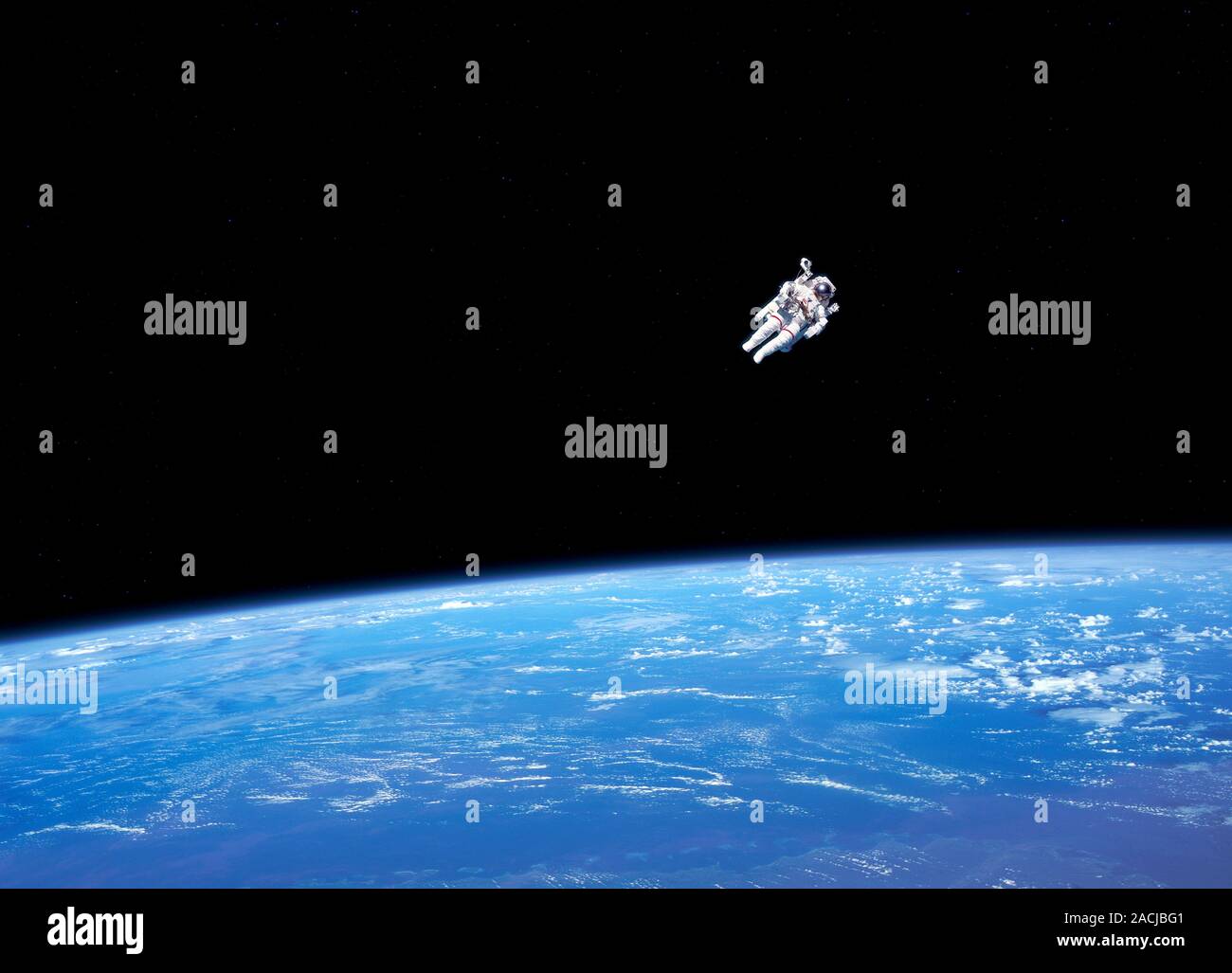 Spacewalk. Astronaut in a Manned Maneuvering Unit (MMU) spacewalking ...
