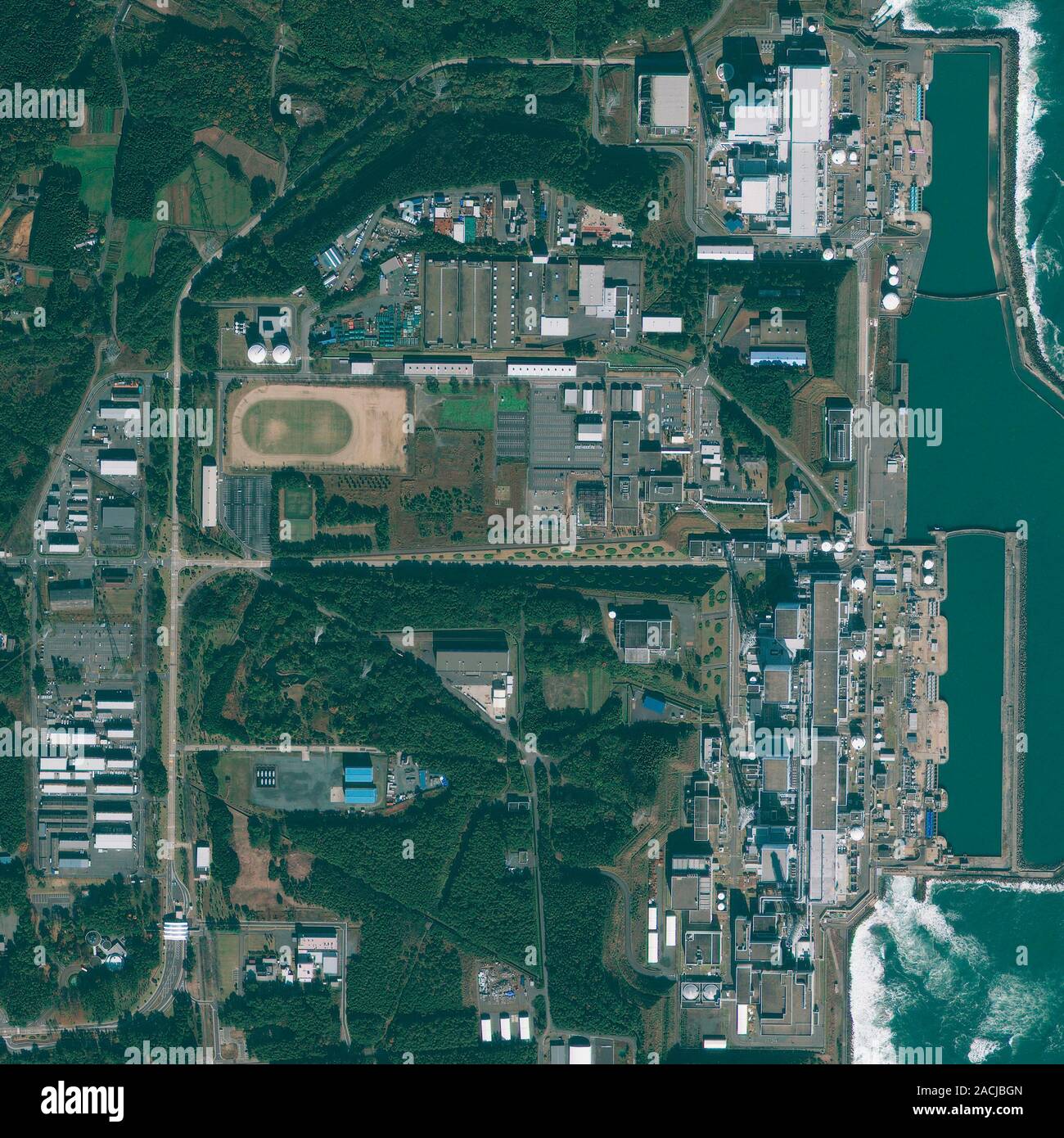 Fukushima nuclear power plant. Satellite image of the Fukushima Dai ...