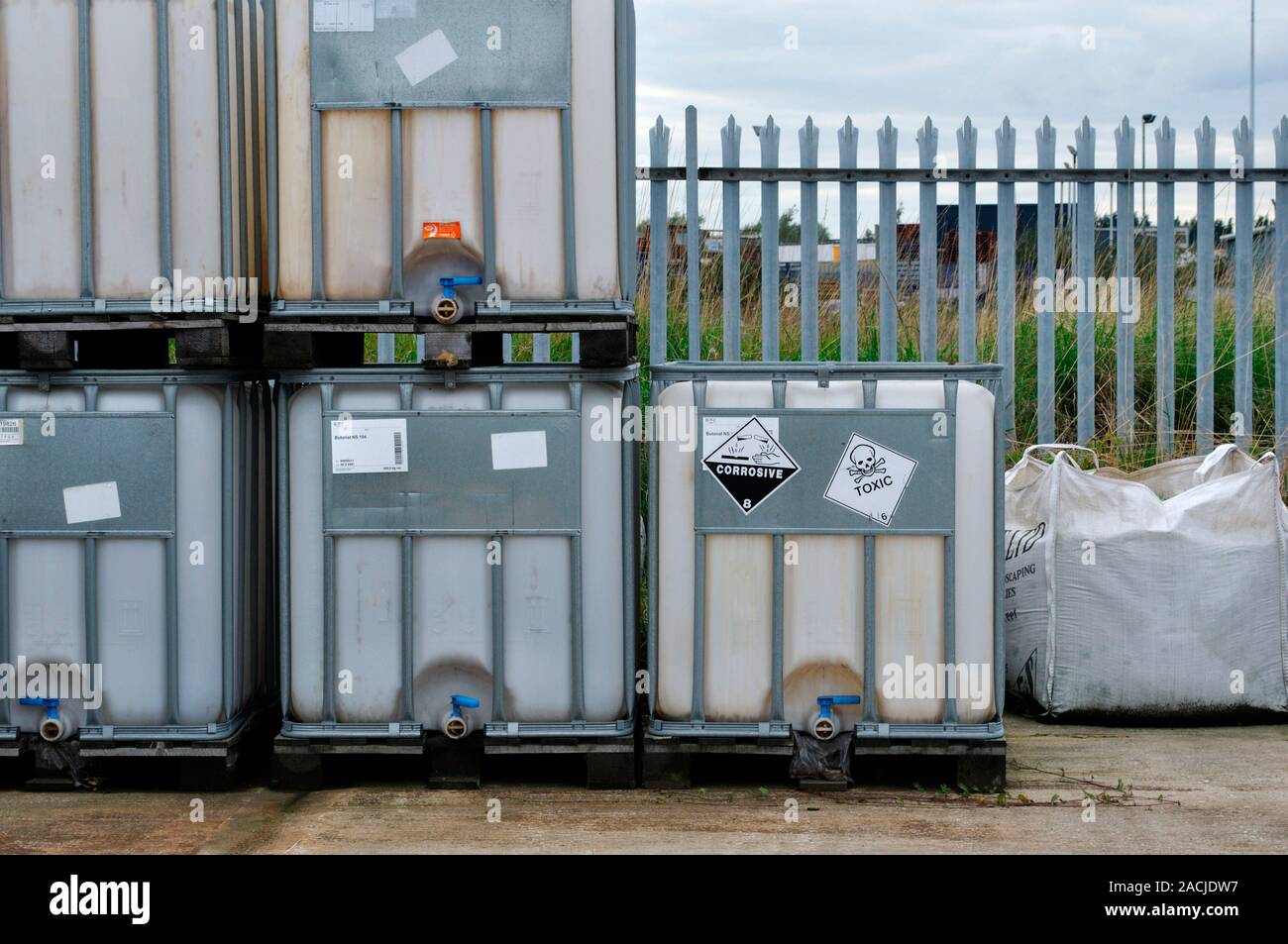 Chemical storage tanks. Small chemical tanks enclosed in transportation ...