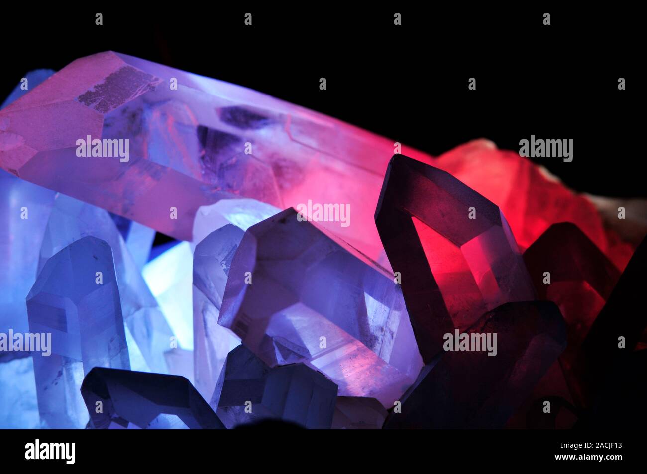 Colourful crystals. Mineral crystals light up with colourful lights ...