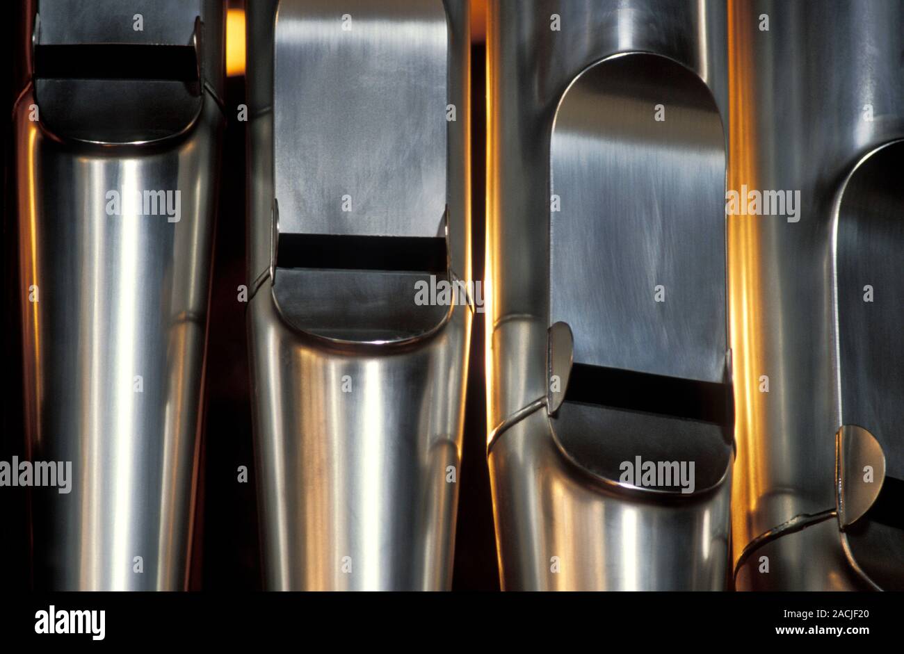 Organ building. Close-up of pipes from a pipe organ that is being built ...