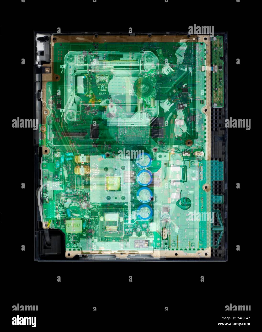 Games console. Coloured X-ray showing the internal components of a ...