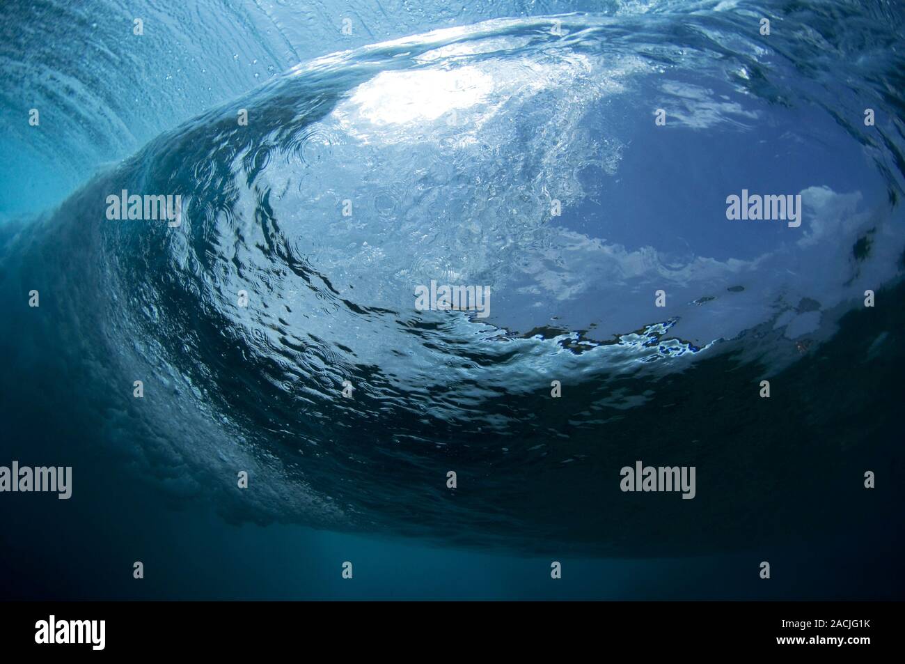 Waves crashing, seen from below. Photographed on North Male Atoll ...
