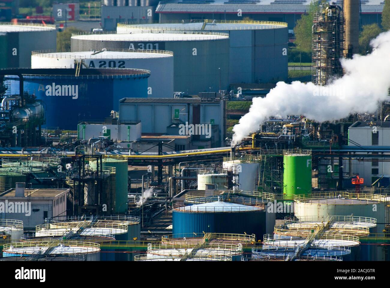 Oil refinery. View over storage tanks at a petrochemical plant ...