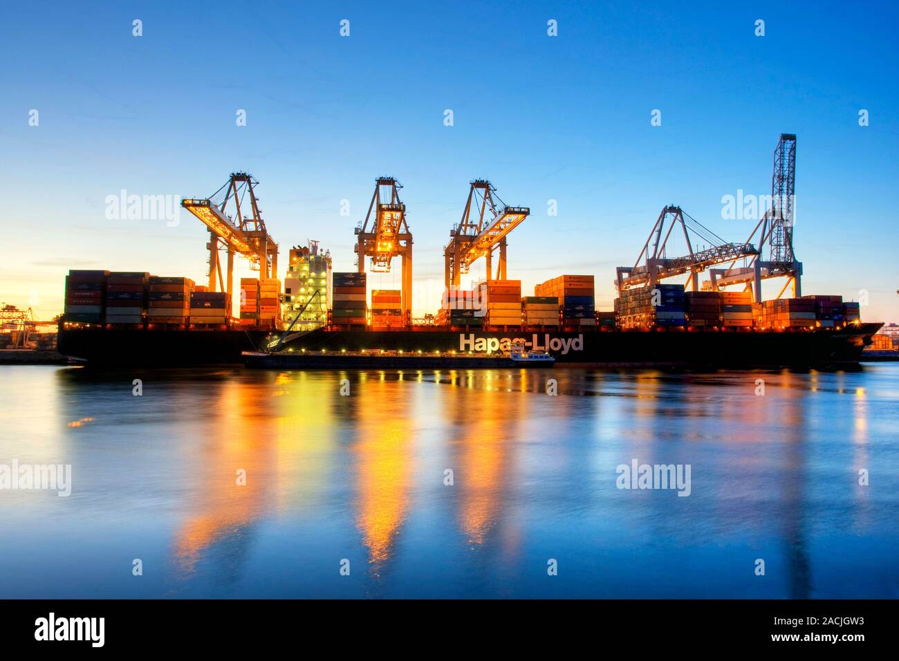 Amazonehaven container ship terminal at night. Ship loaded with ...