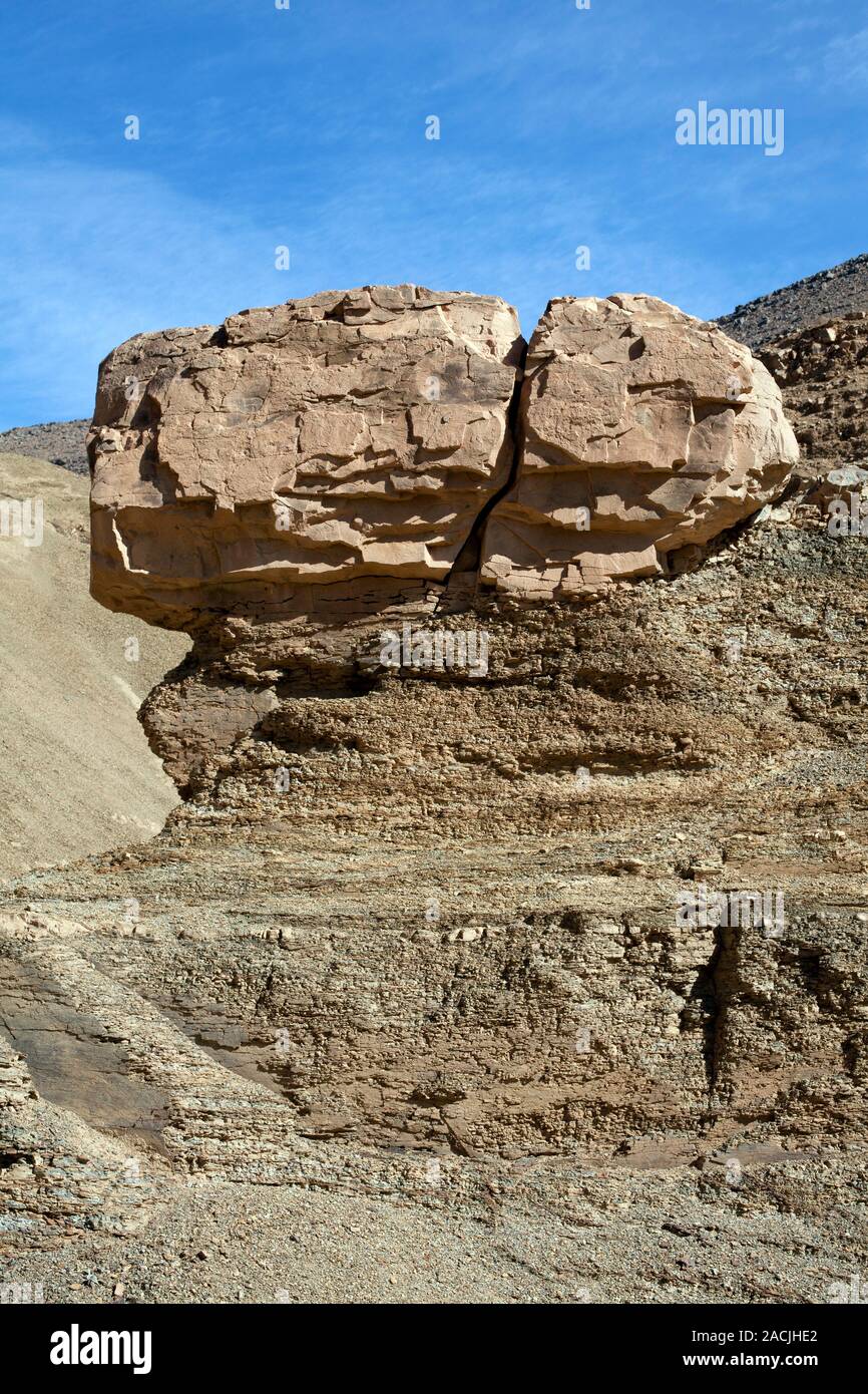 Limestone concretion on a shale slope. A concretion is a sedimentary ...