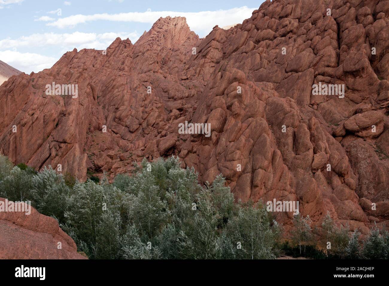 Weathered sandstone. Rounded sandstone cliffs that have been eroded by ...