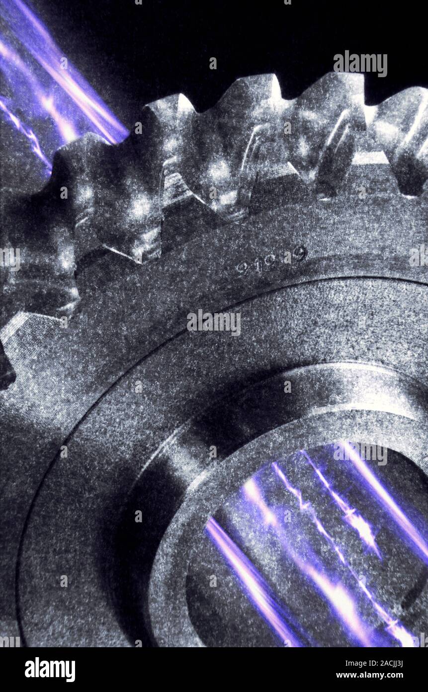 Electromechanics, conceptual image. Flash of electricity (purple ...