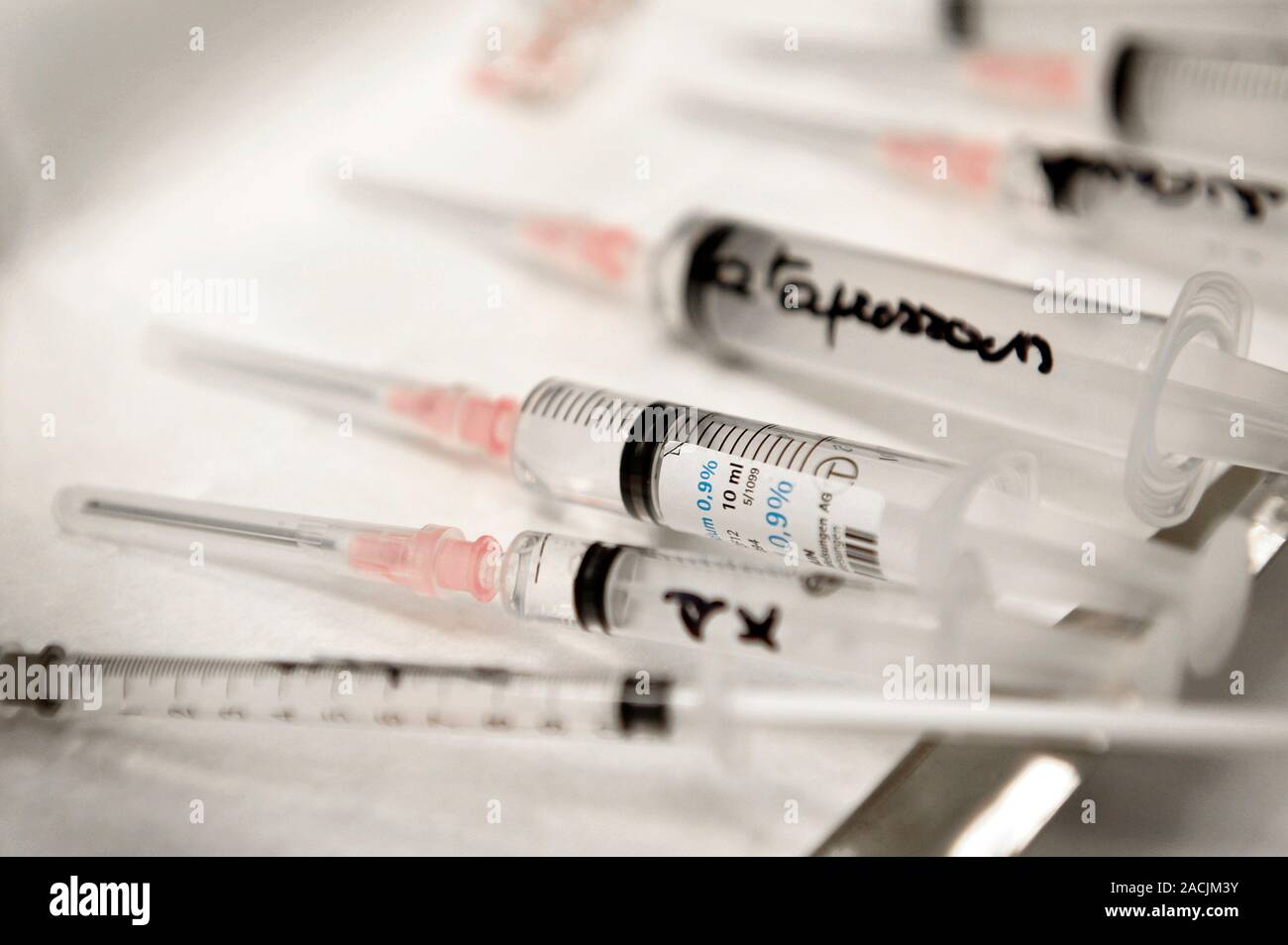Medical syringes in an operating theatre Stock Photo - Alamy