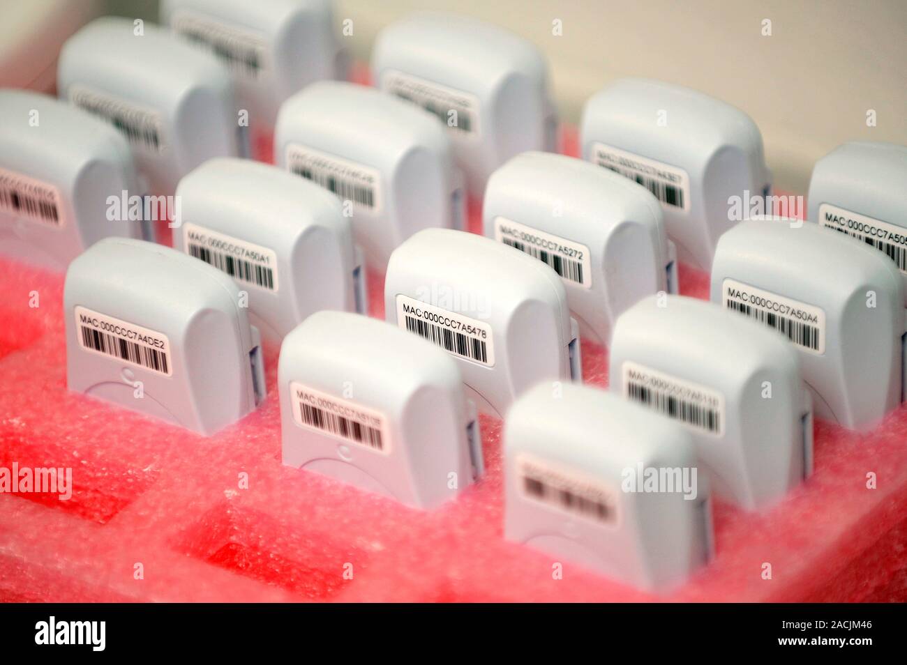 Wireless patient ID tags. Tray of RFID (radio-frequency identification ...