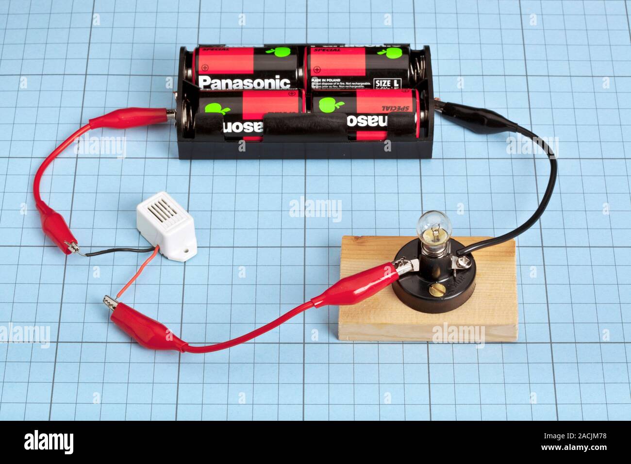 Buzzer circuit. Circuit showing a buzzer (left) connected in series ...