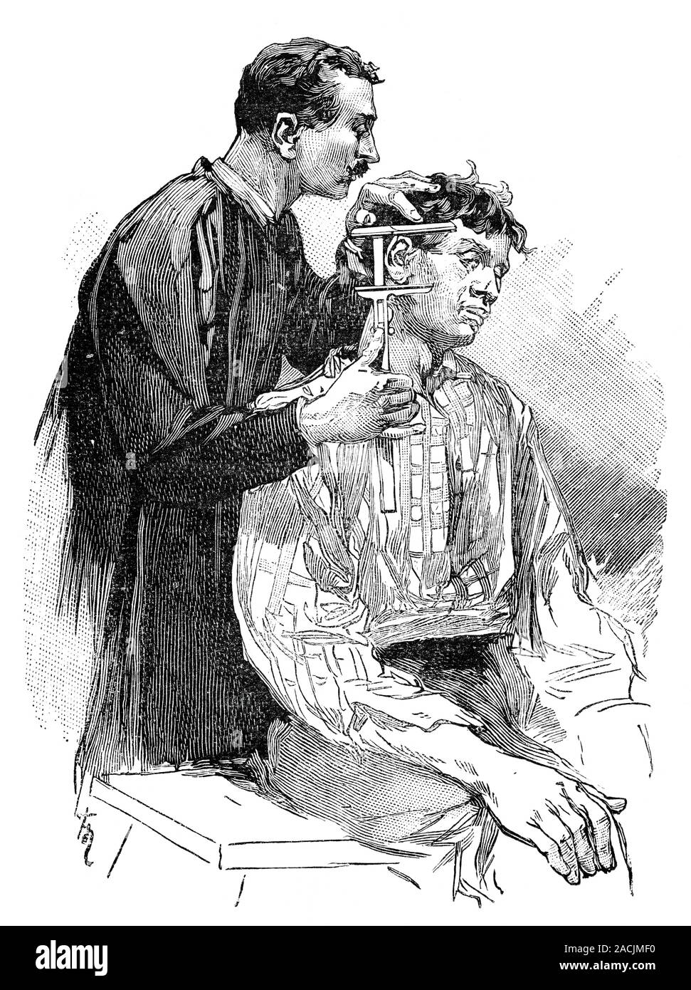 Anthropometry. Man having the length of his ear measured. This ...