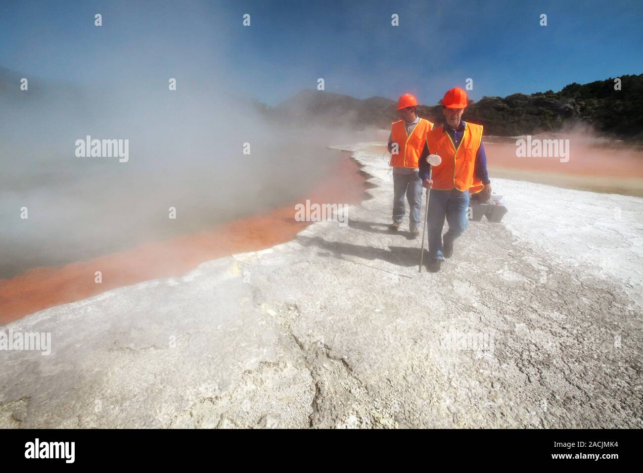 Extremophile research. Researchers collecting samples and measuring the ...