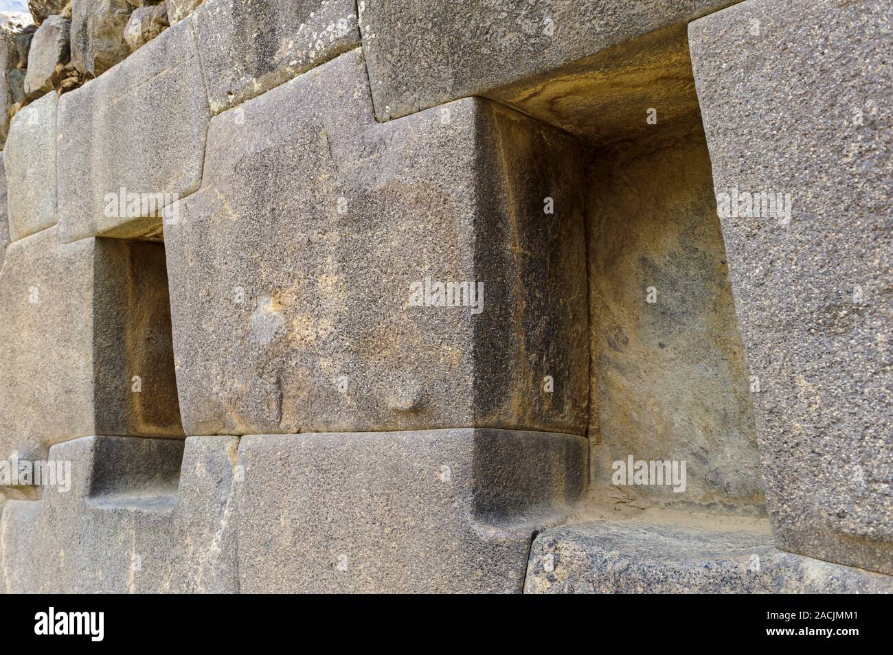 Inca wall. The Incas built walls with precisely cut stones that fitted ...