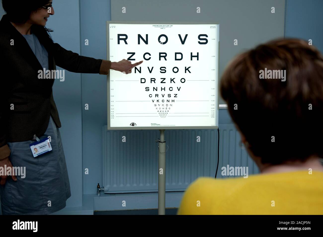 Eye test. Patient undergoing an eye test in a hospital ophthalmology ...