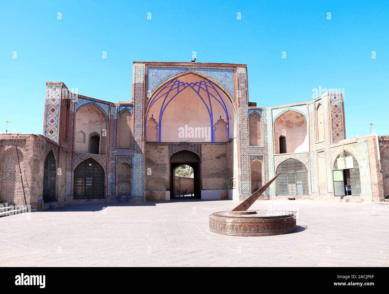Antique sundial in front of the entrance to Jameh Mosque (Masjid-e ...
