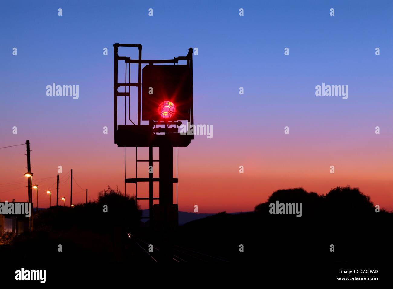 Red railway signal. This signal is used to warn train drivers. This is ...