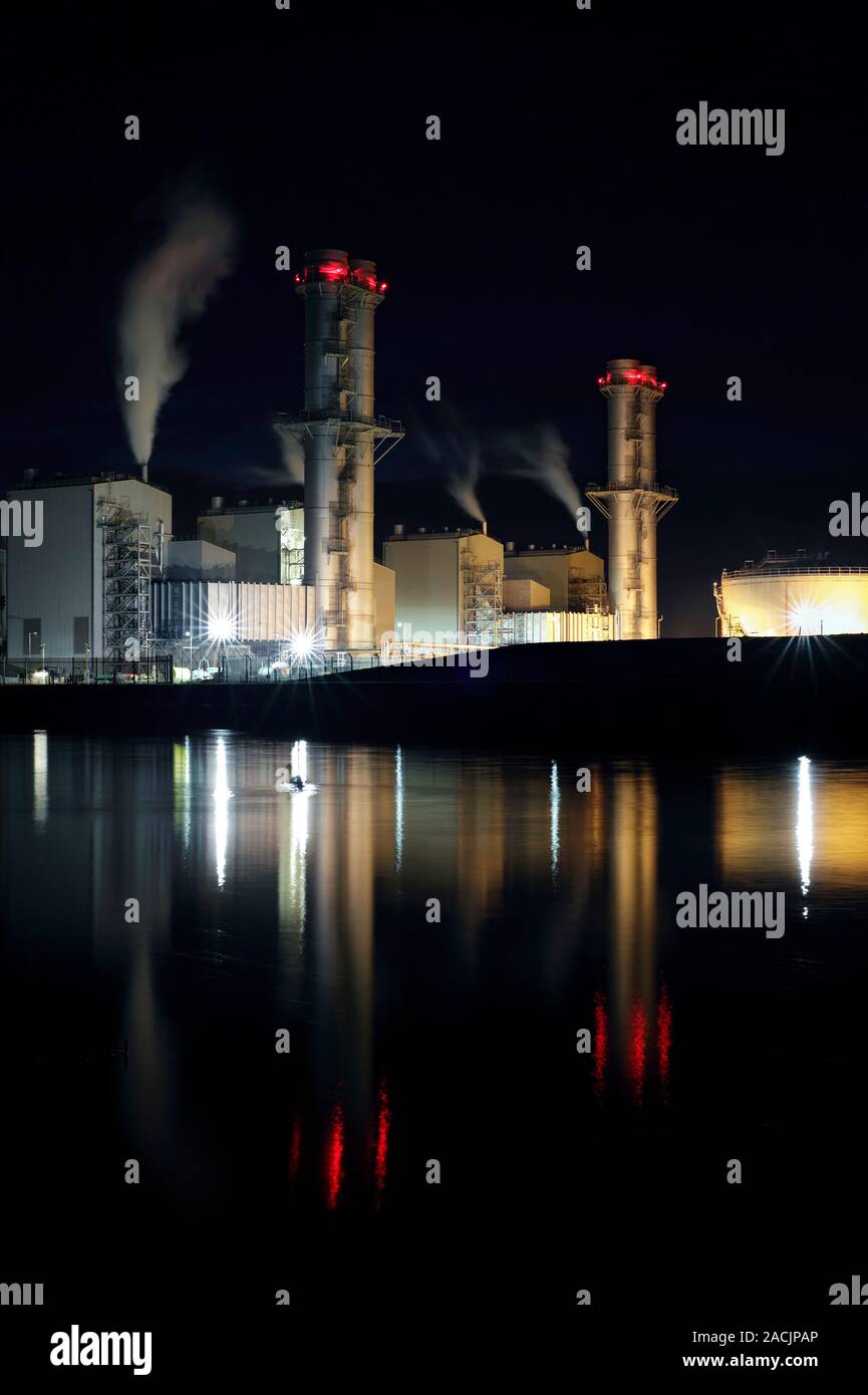 Combined cycle gas turbine (CCGT) power station at night. This is the ...
