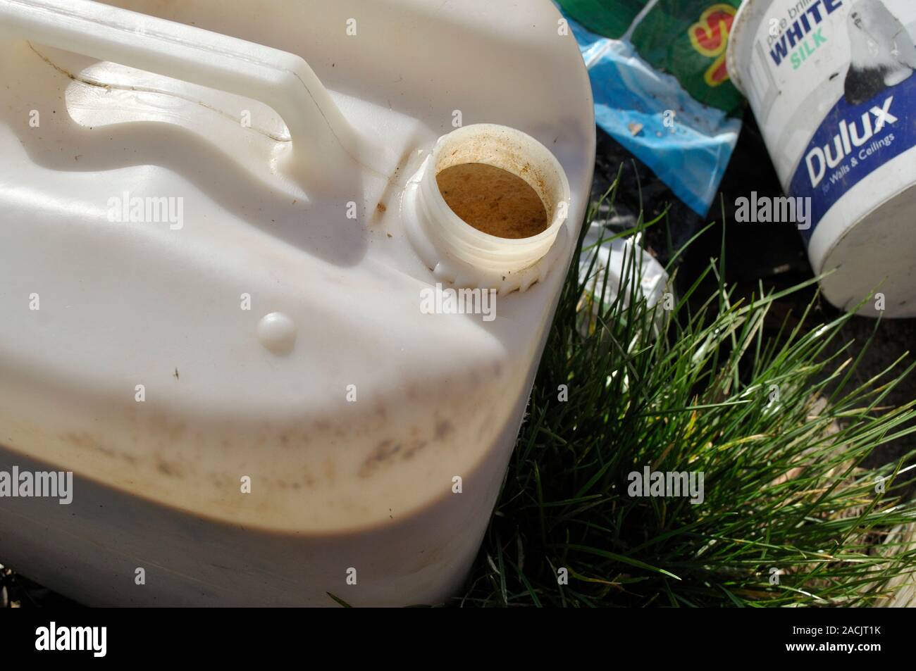 Flytipped containers containing liquid waste, Aldridge, West Midlands ...