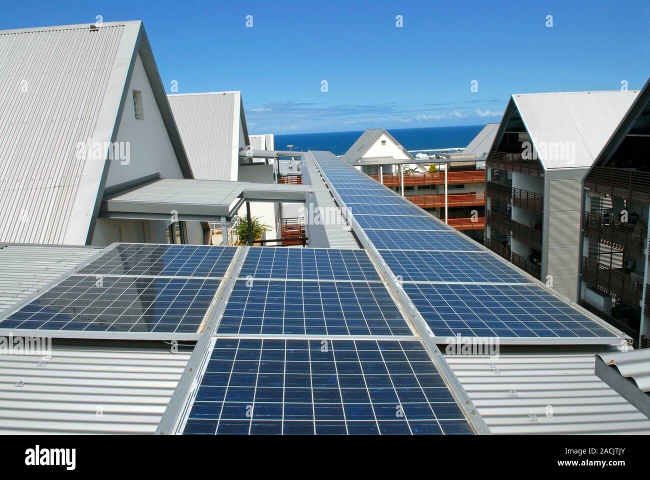 Solar panels. Photovoltaic cells on the roofs of buildings ...