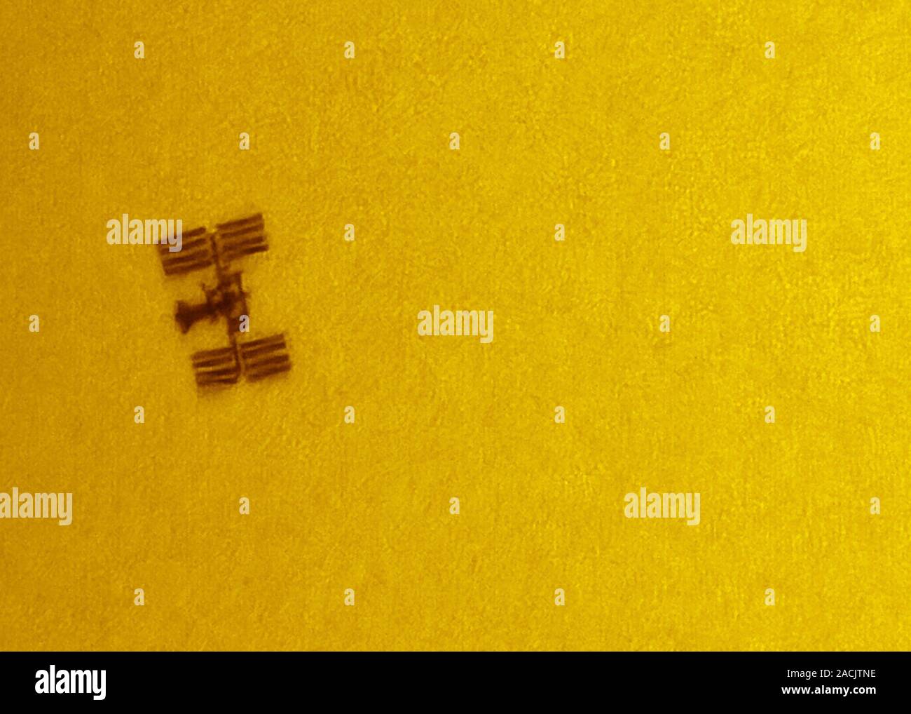 ISS and Endeavour against the Sun. Silhouette of the International ...