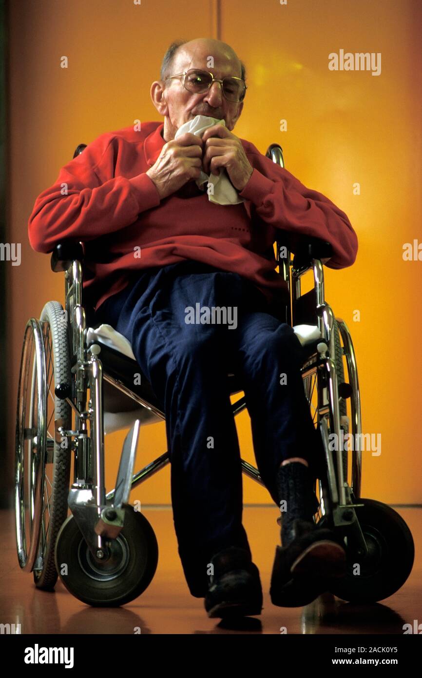 Elderly man with dementia in a wheelchair on the geriatric ward of a ...