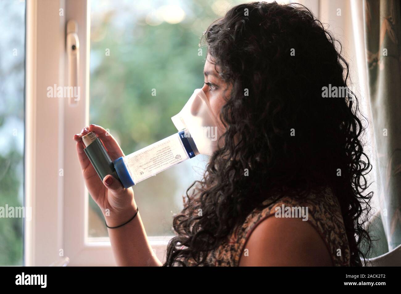 Not for use in Television Not for use in Television Woman using an ...