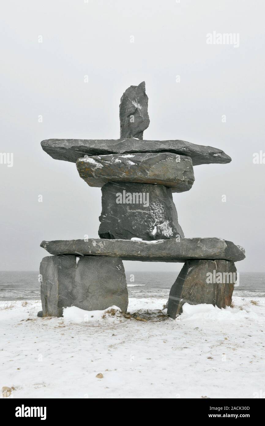 Inuksuk stone cairn. Cairns like this are raised in the Canadian Arctic ...