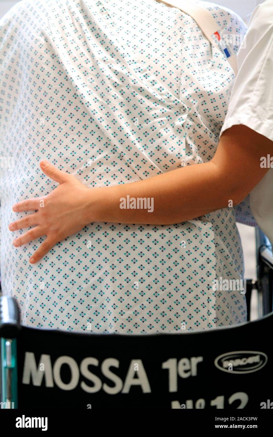 Geriatric care. Nurse with an elderly patient on the geriatric ward of ...