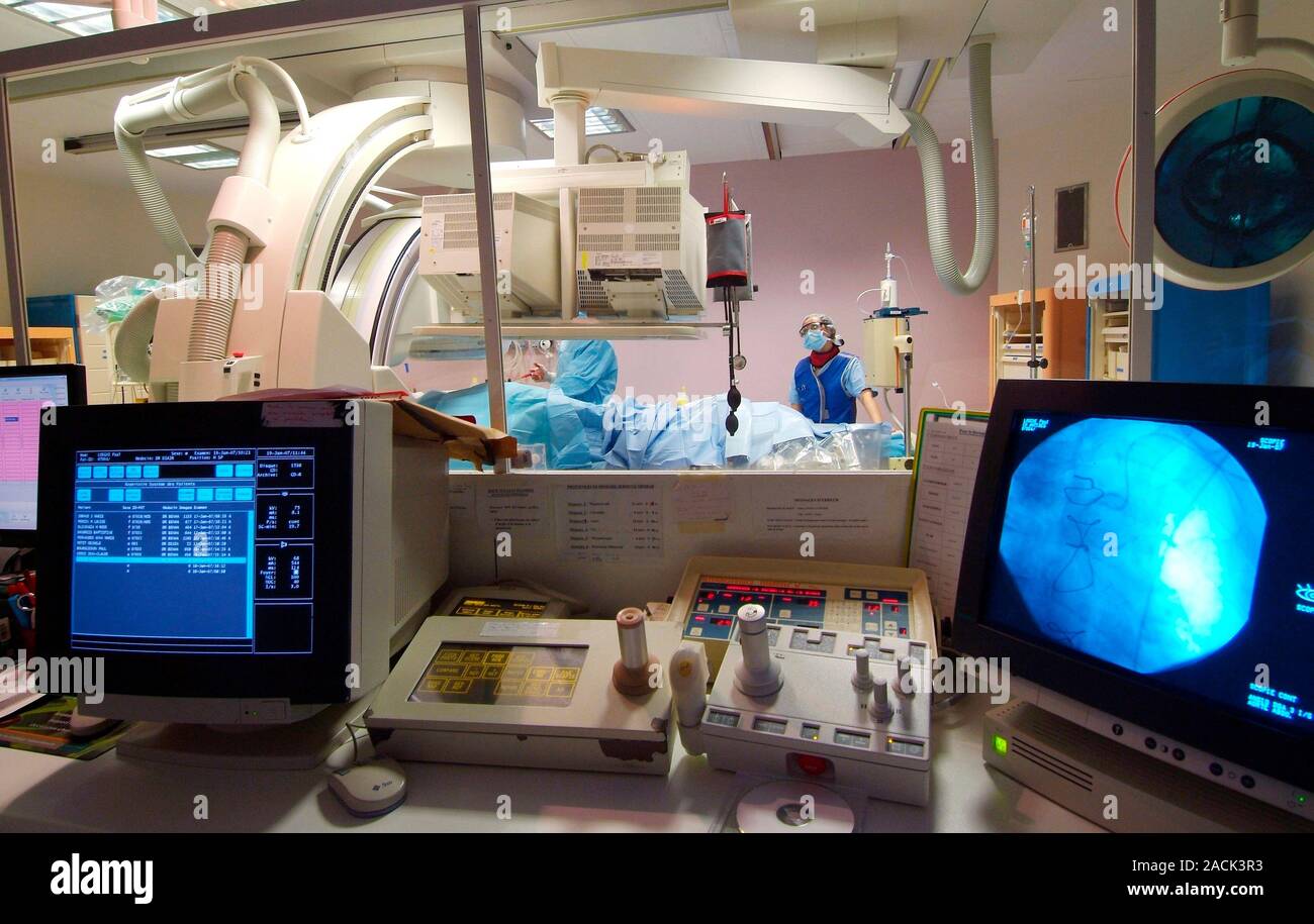 Angiography. View from the control room of medical staff performing an ...