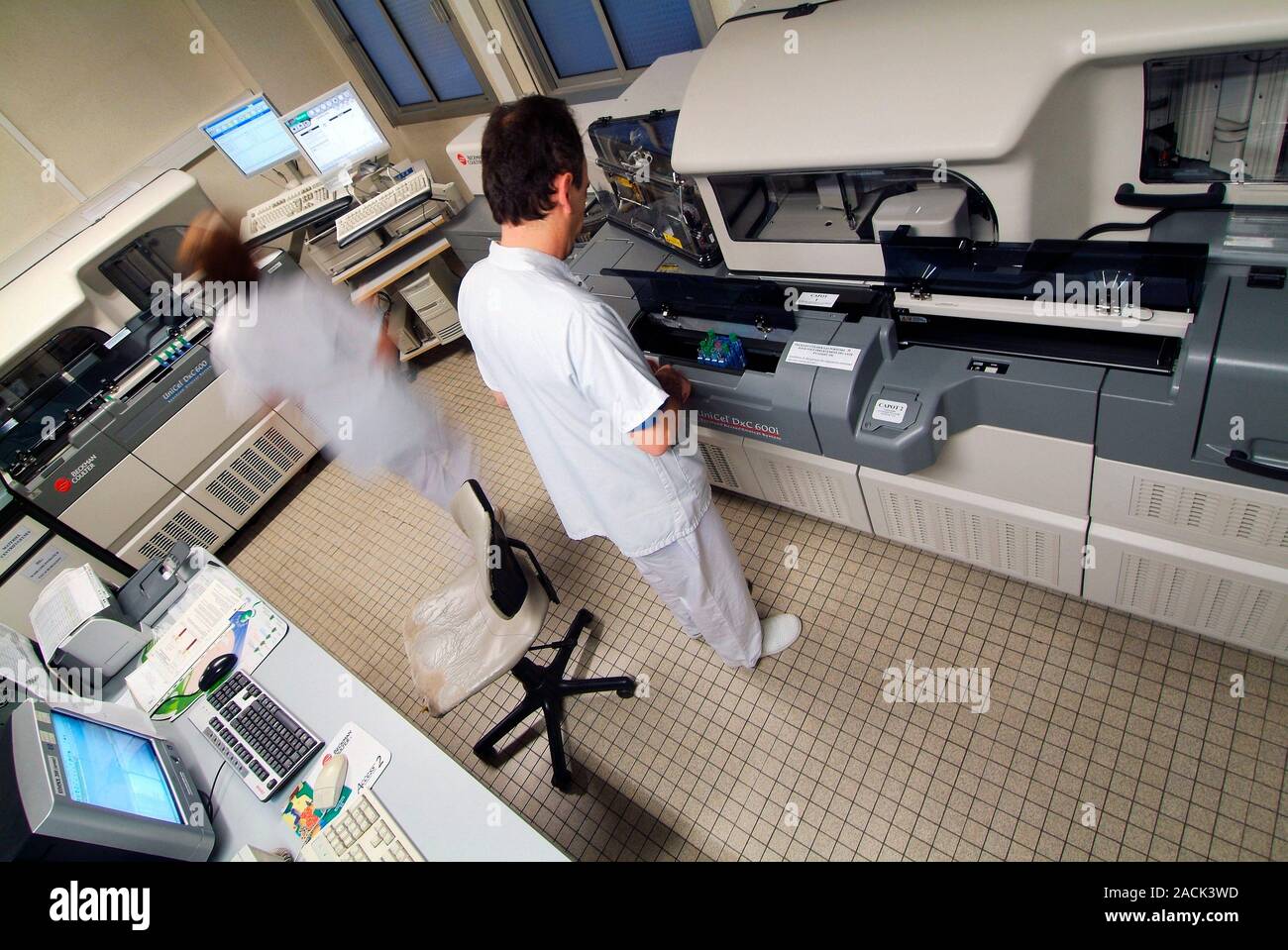 Biochemistry lab. Technicians working in a biochemistry laboratory ...