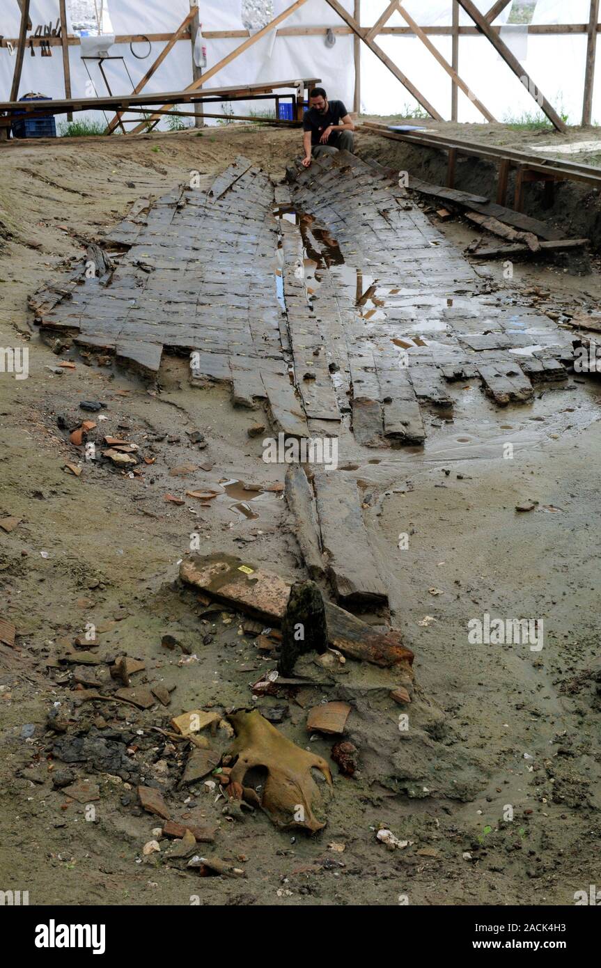 Byzantine boat excavation. Archaeologist marking the planks of a ...