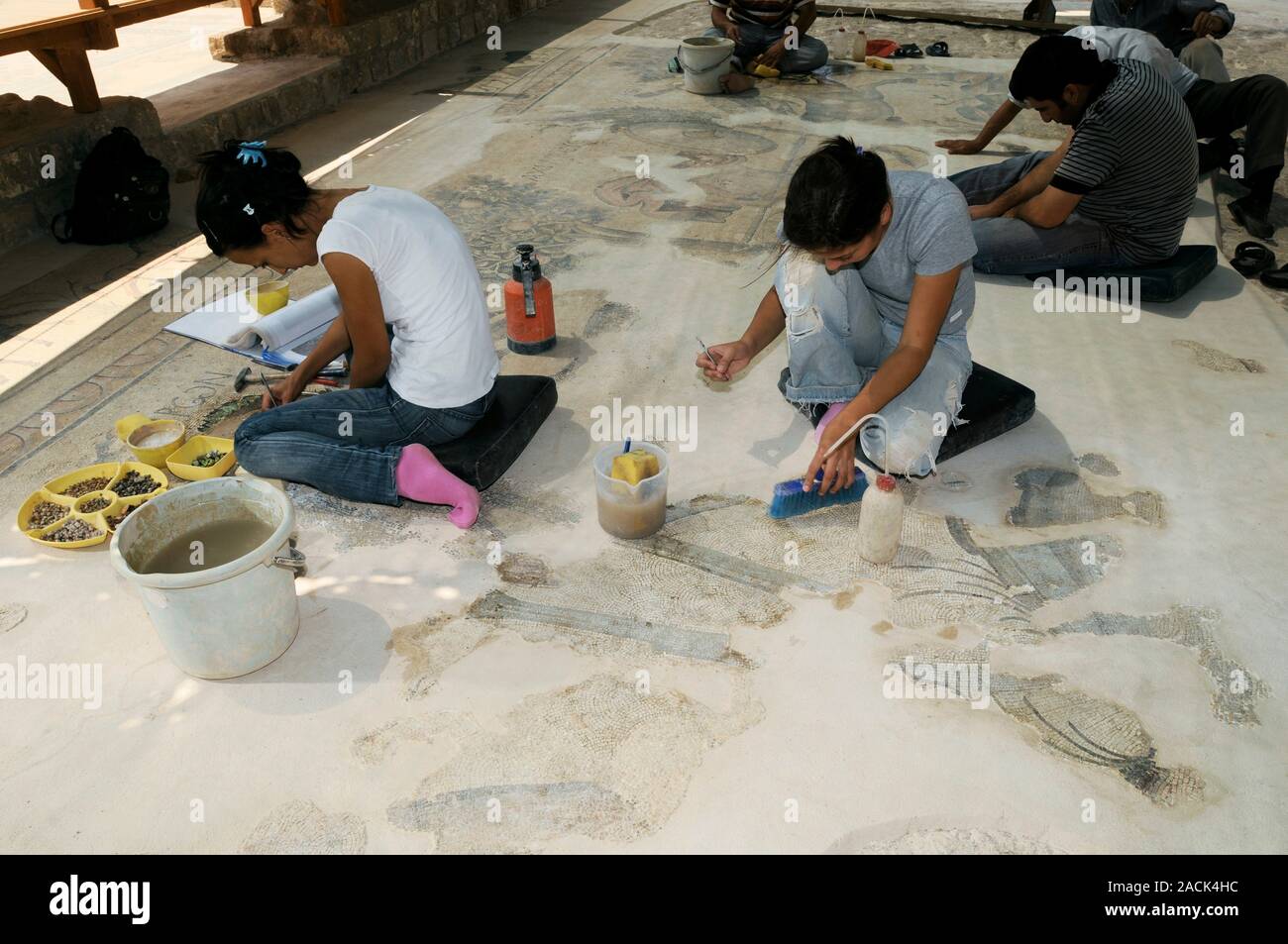 Byzantine mosaic excavations. Archaeologists cleaning and restoring ...