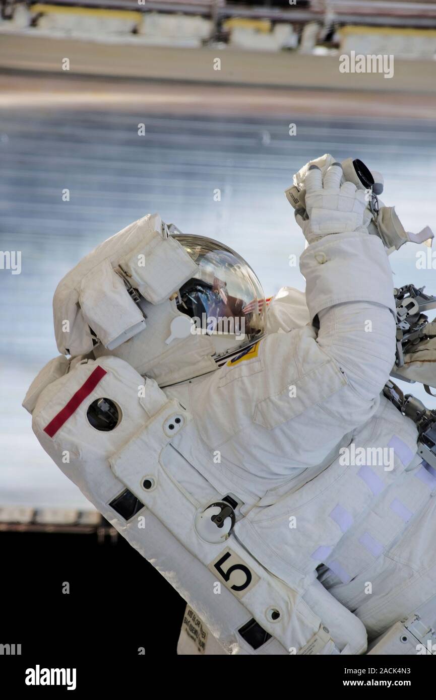Mission STS-133 space walk. NASA astronaut Steve Bowen taking a ...