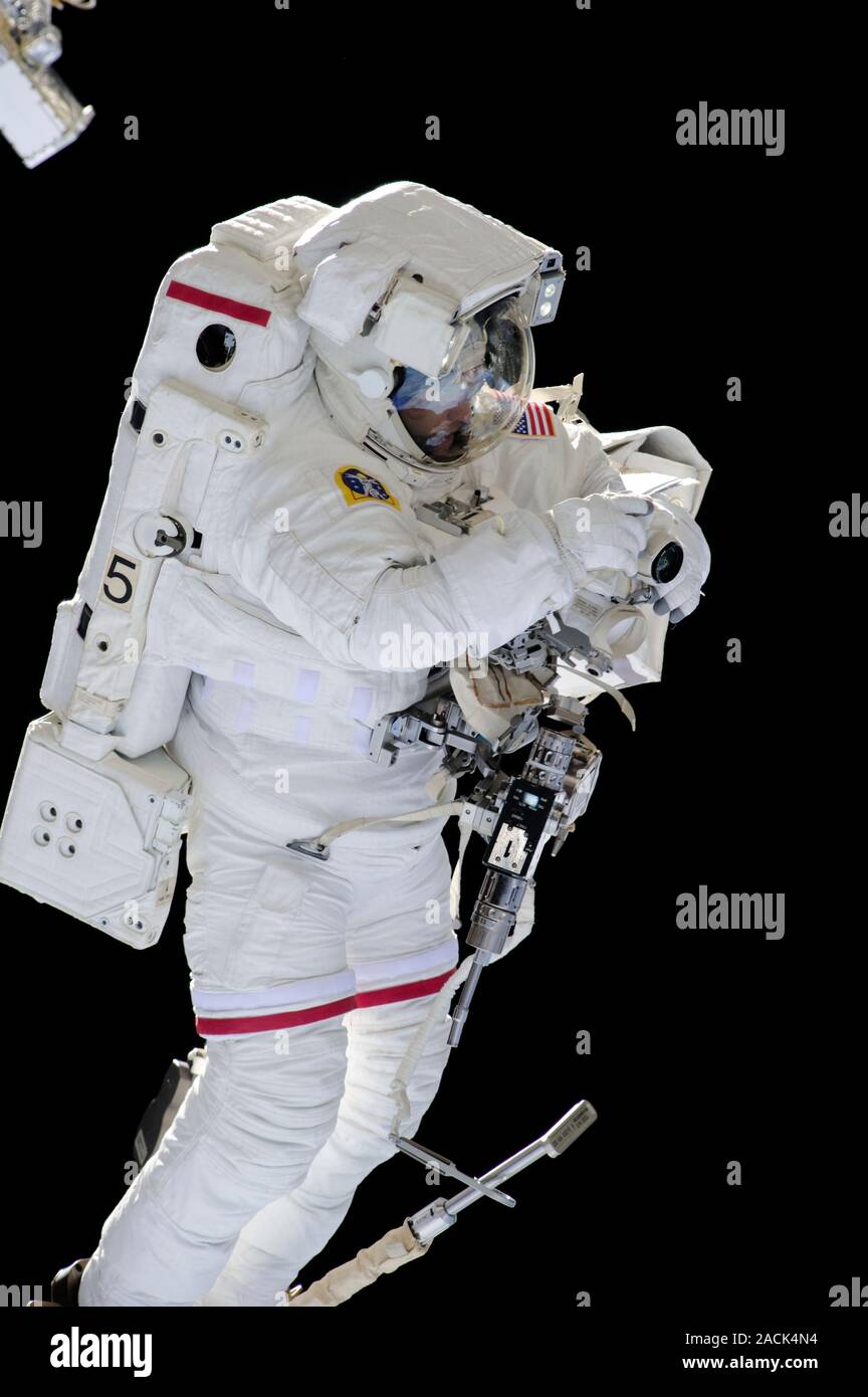 Mission STS-133 space walk. NASA astronaut Steve Bowen taking a ...