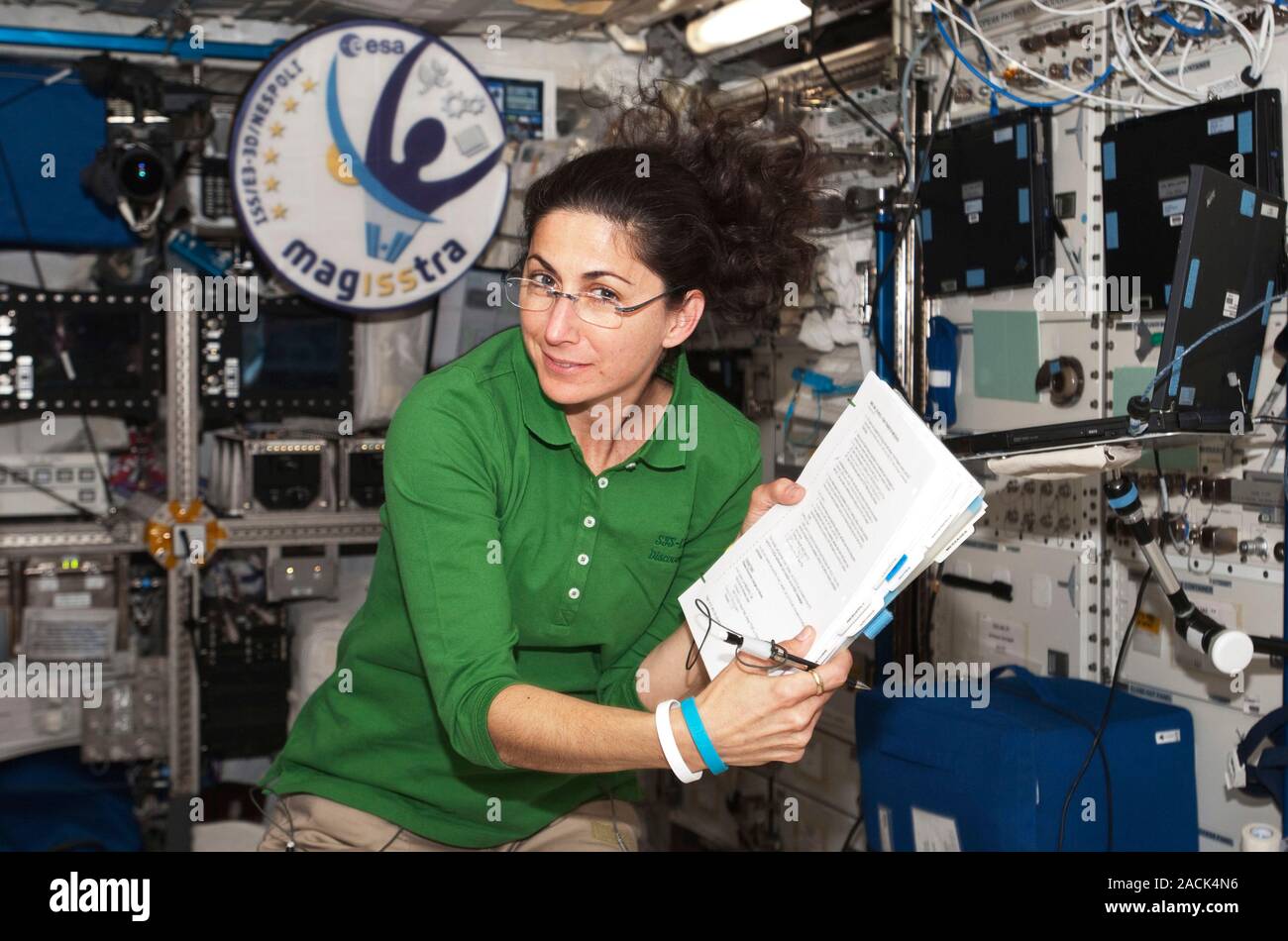 NASA astronaut Nicole Stott (born 1962) in the Columbus laboratory ...