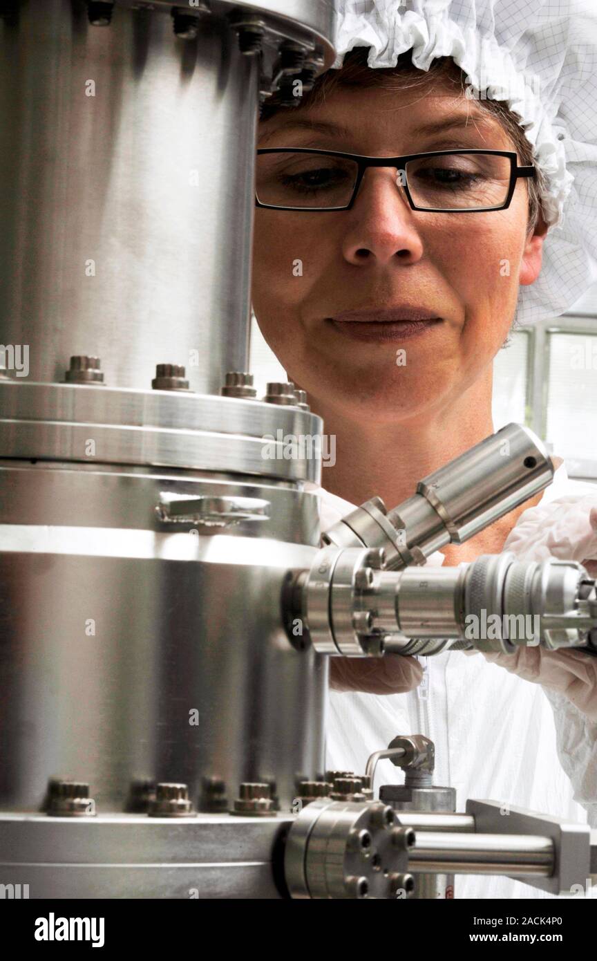 Spectrometry. Scientist using a spectrometer. Spectrometers are ...