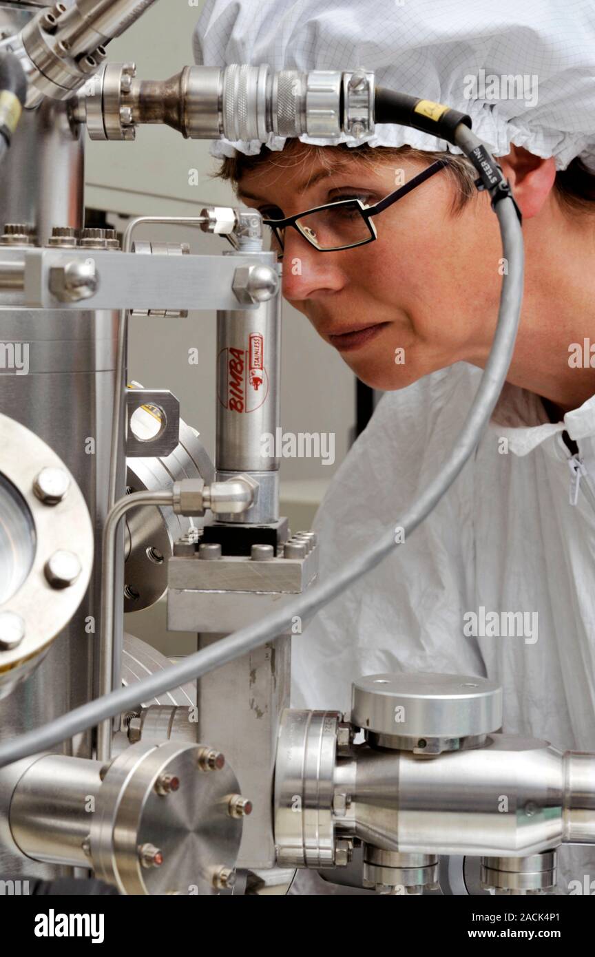 Spectrometry. Scientist using a spectrometer. Spectrometers are ...