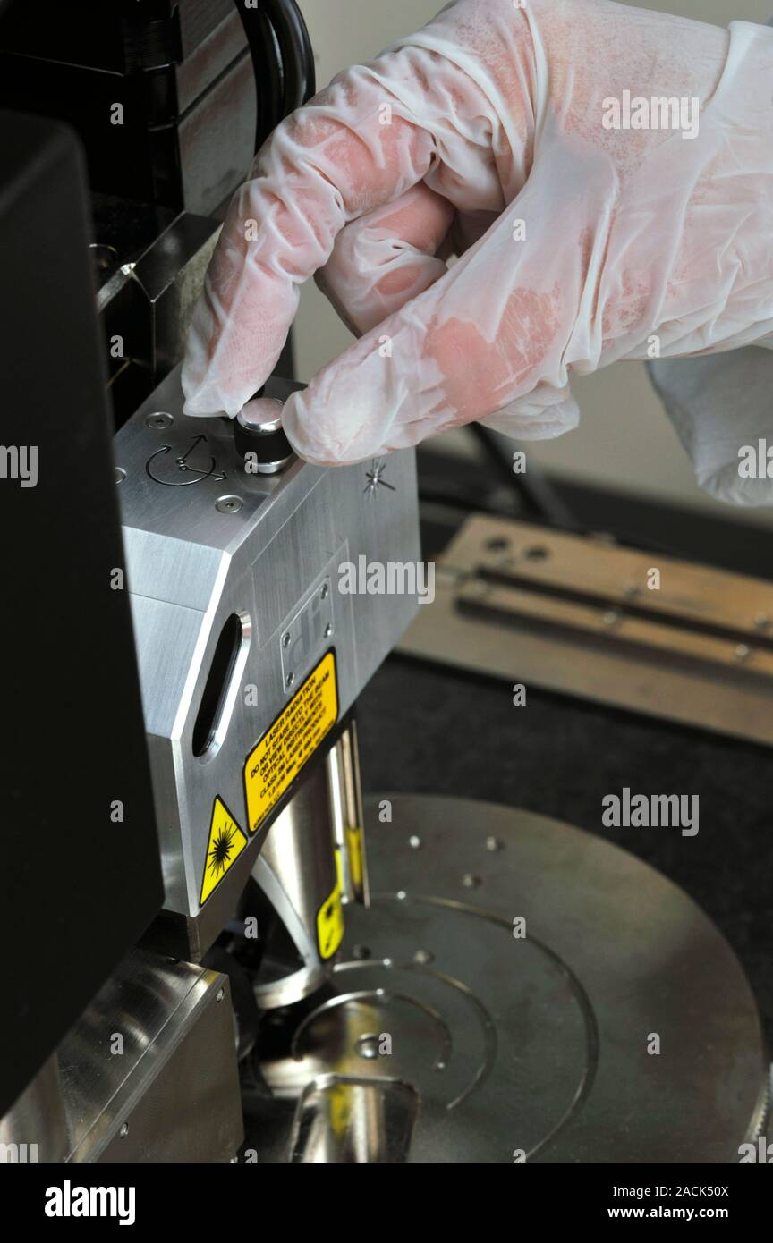 Scanning electron microscope (SEM). Scientist using a SEM in a ...