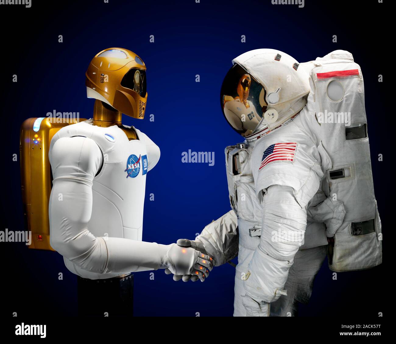 Robonaut 2 and astronaut. Robonaut 2 is a humanoid robot that is being ...