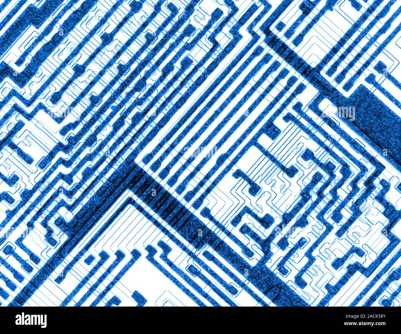 Microchip. Light micrograph of the surface of a microchip using dark ...