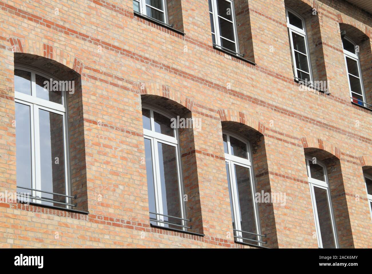 many windows on a house facade Stock Photo - Alamy