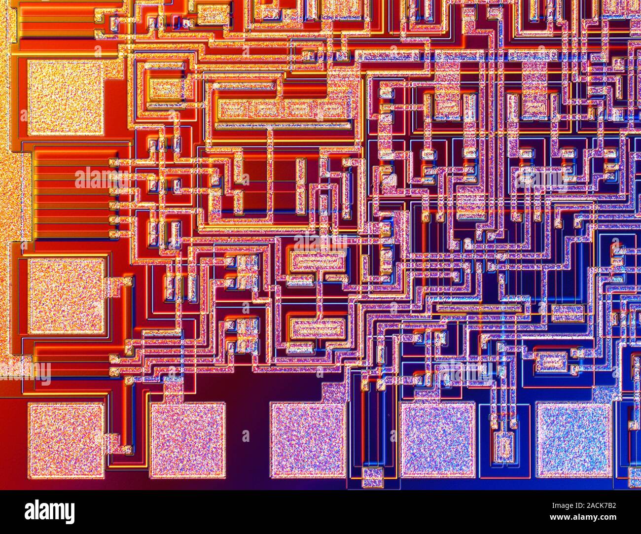 Microchip. Light micrograph of the surface of a microchip using ...