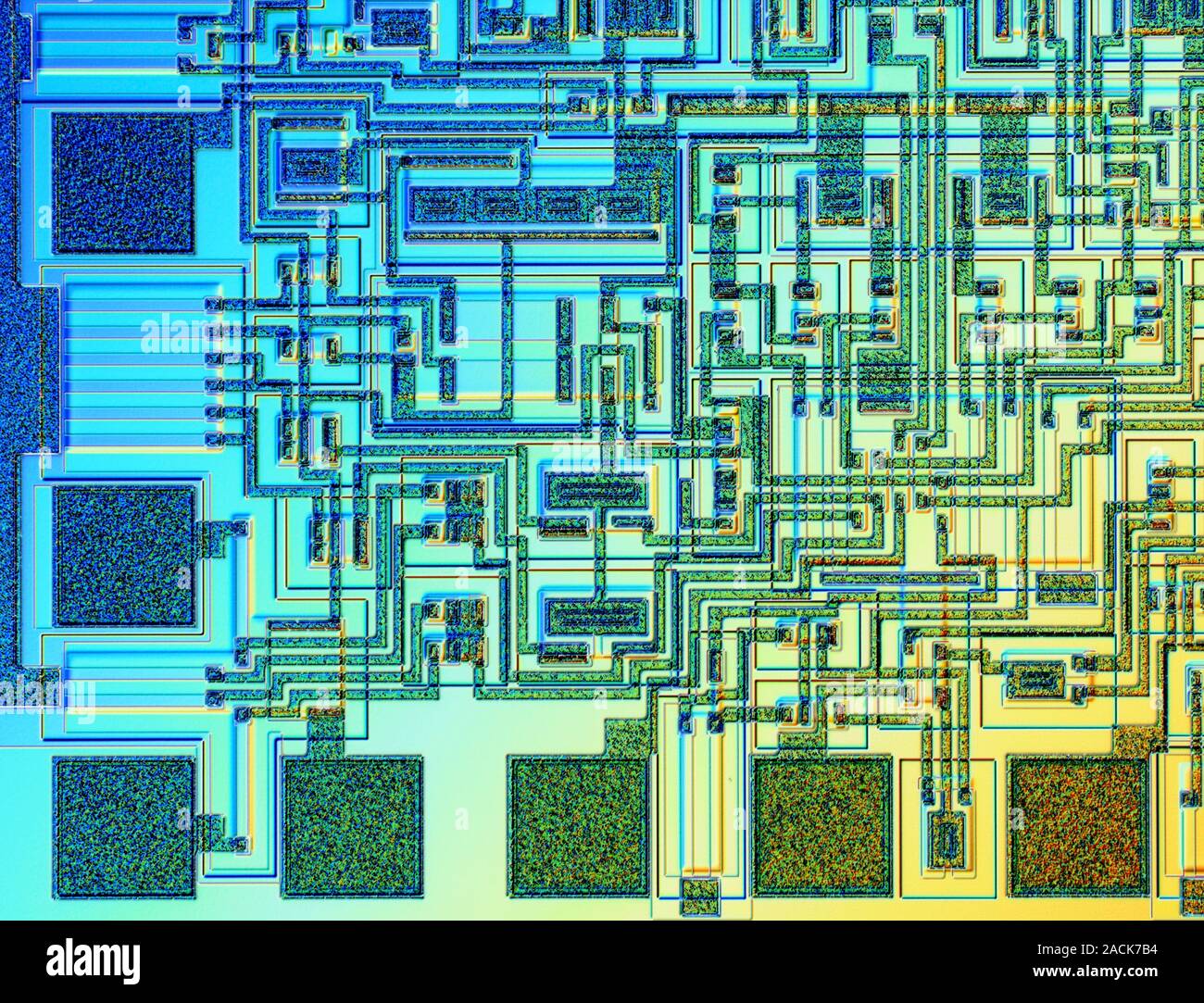 Microchip. Light micrograph of the surface of a microchip using ...