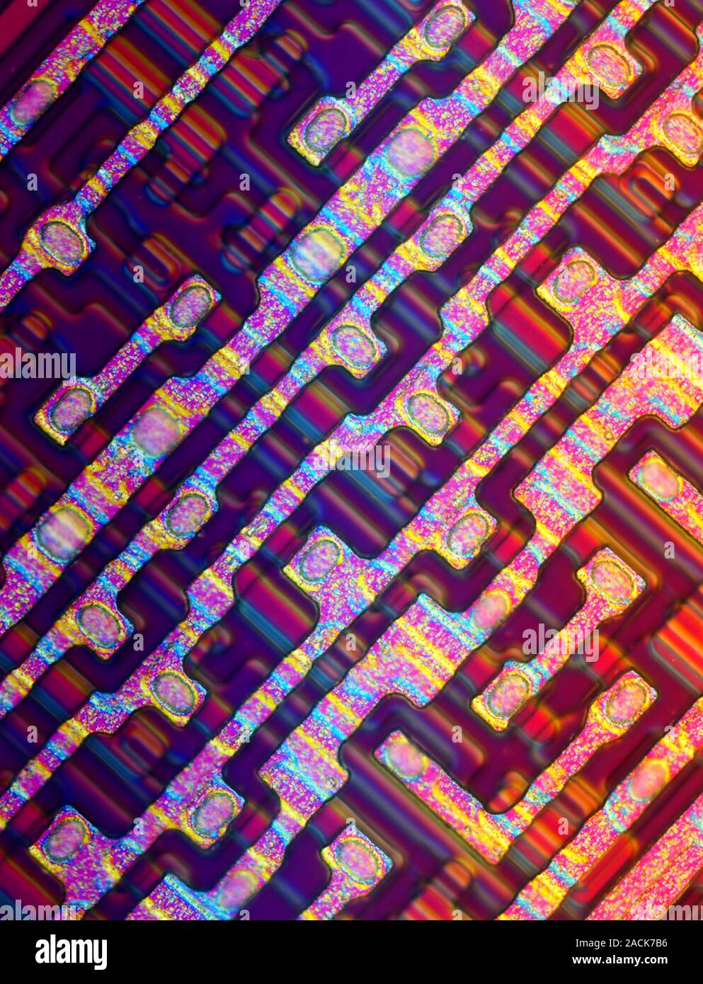 Microchip. Light micrograph of the surface of a microchip using ...