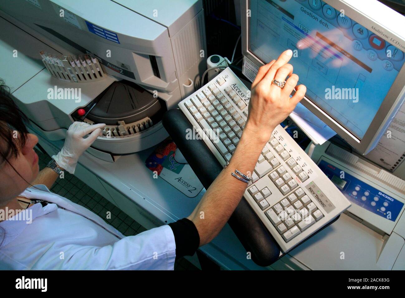 Immunology lab. Technician working in an immunology laboratory ...