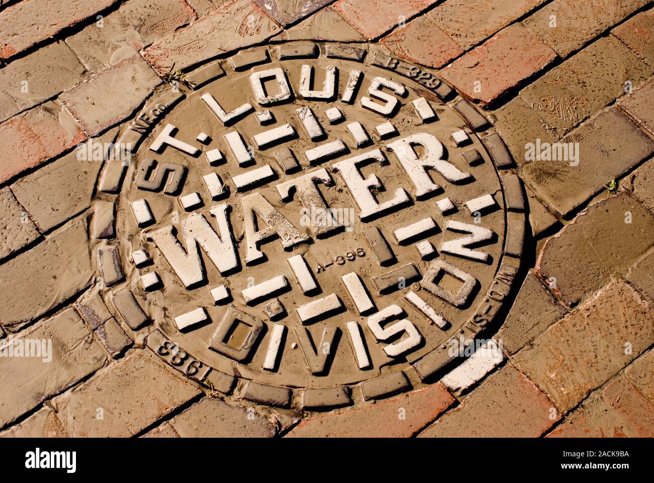 St Louis Water Division manhole cover showing a layer of silt deposited ...