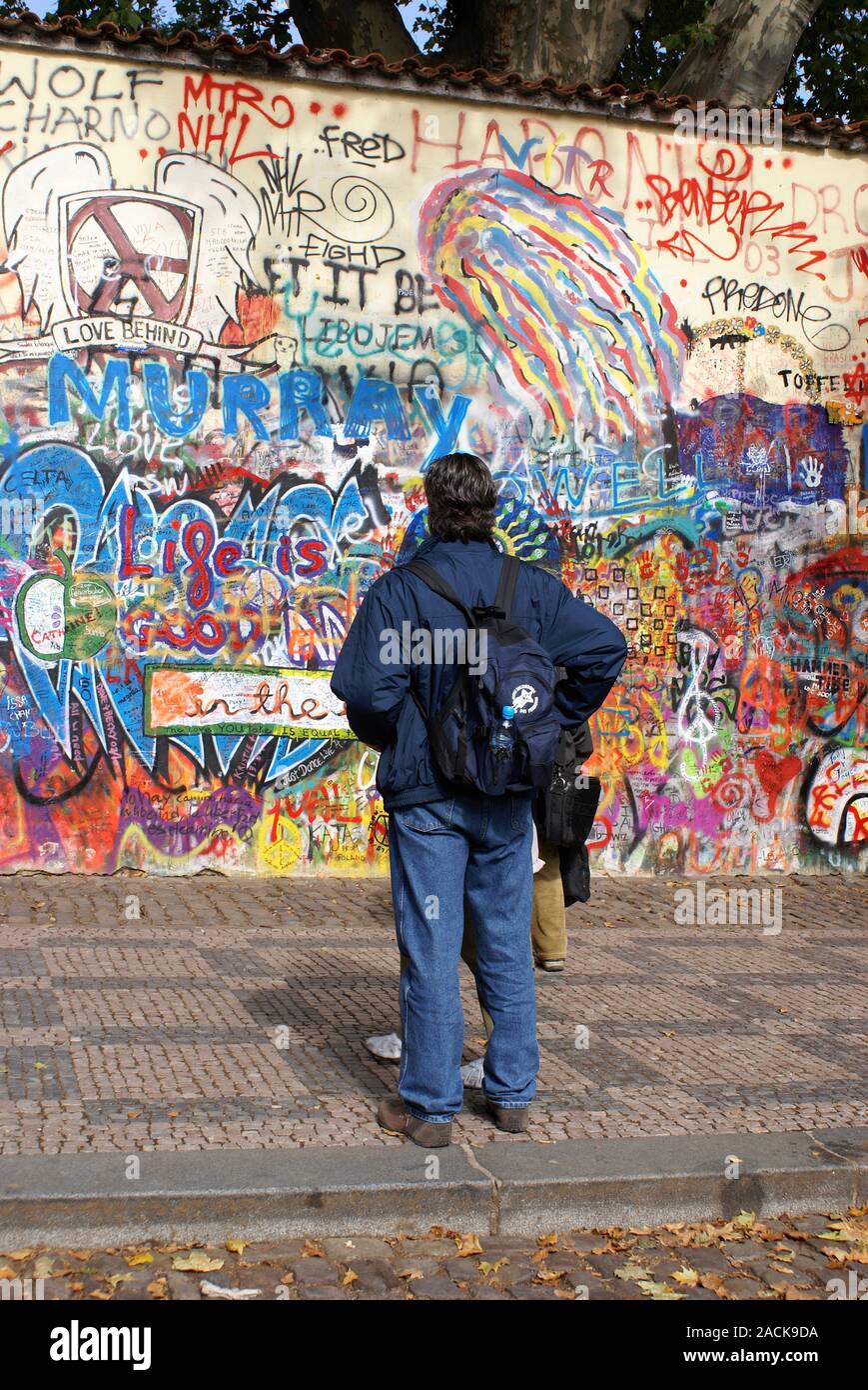 The Lennon Wall in Prague, Czech Republic. A graffiti-covered wall ...