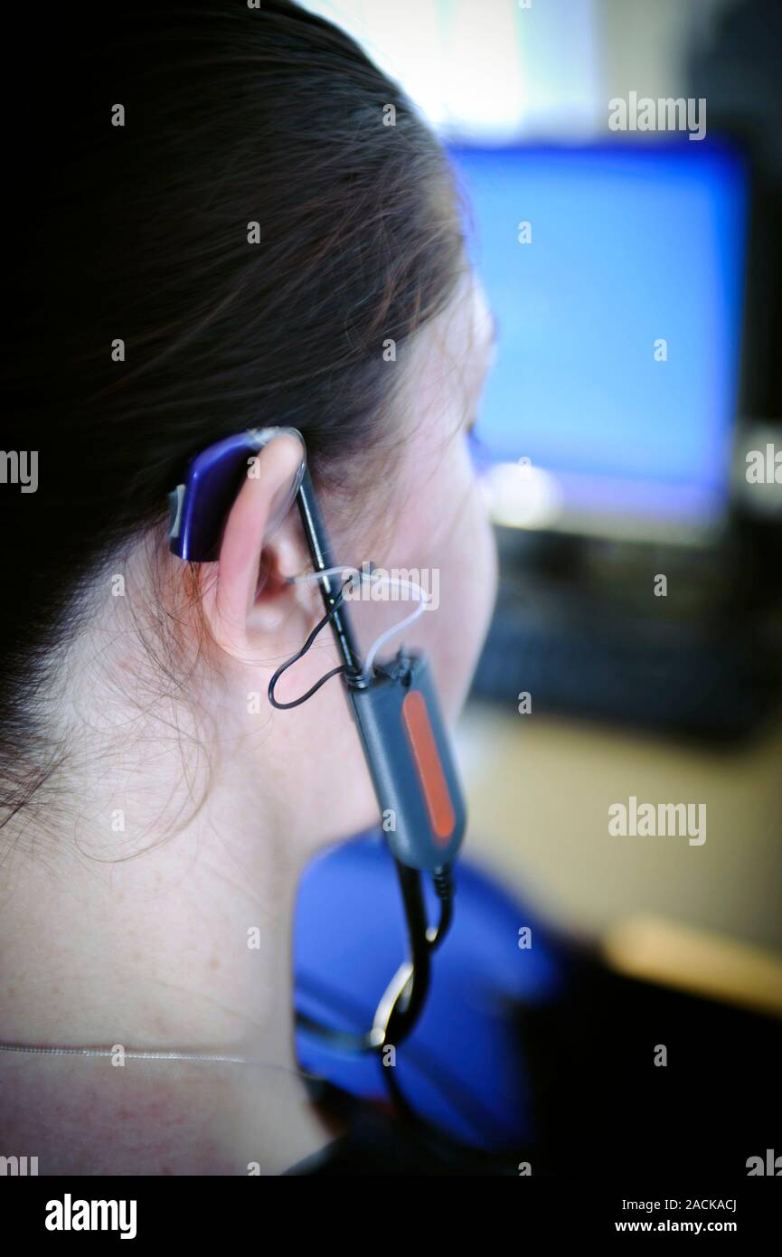Hearing test. Audiology student wearing a hearing aid test device Stock ...