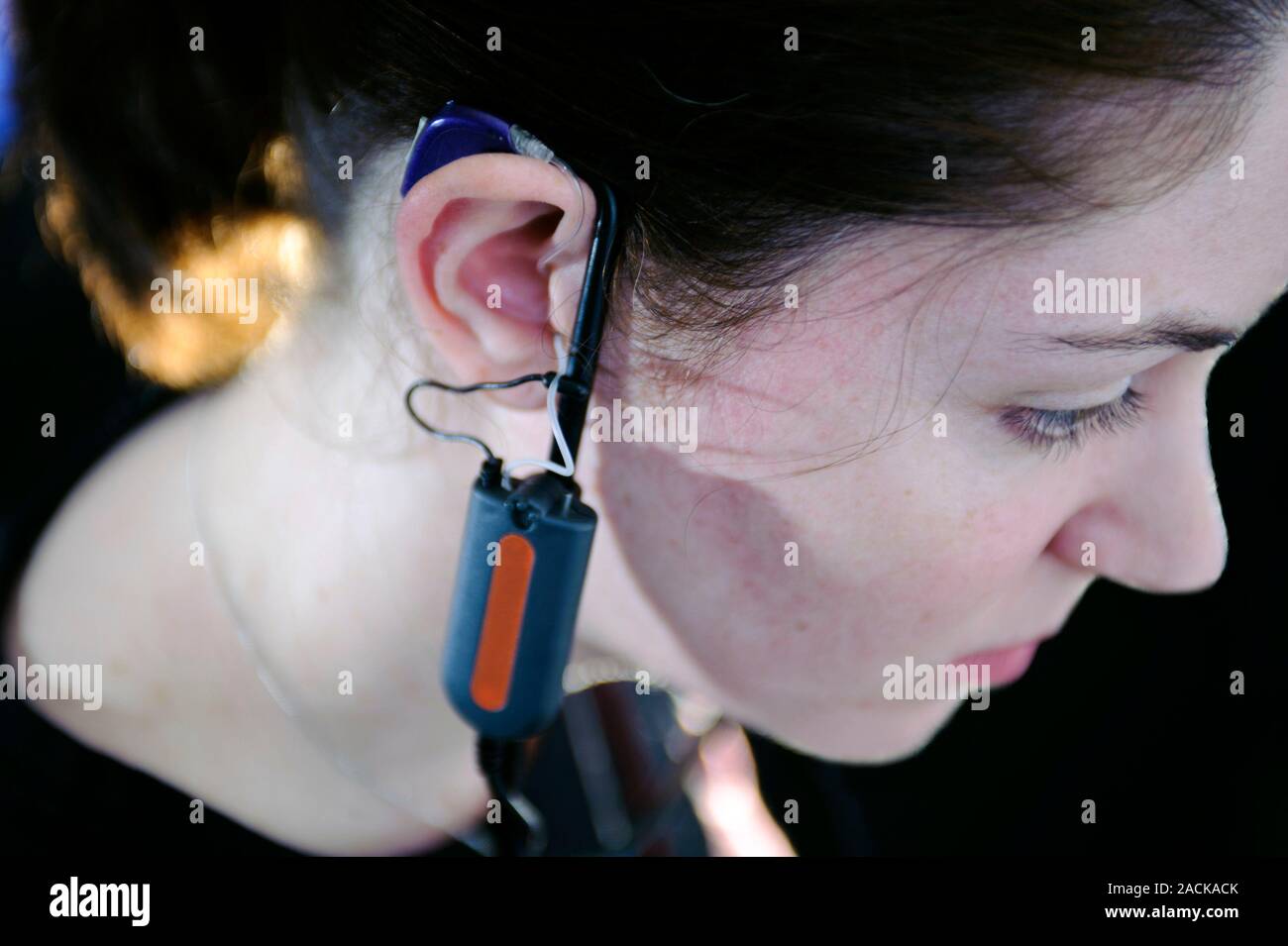Hearing test. Audiology student wearing a hearing aid test device Stock ...